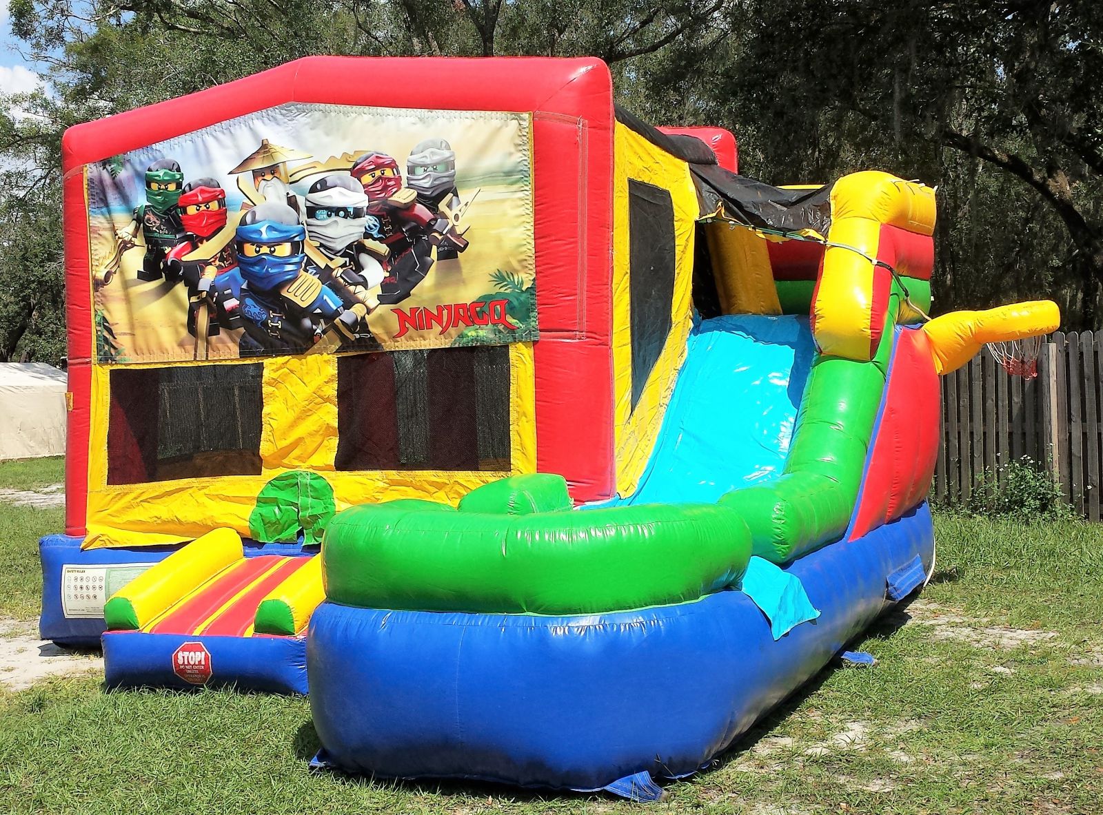 Ninjago multi colored 6 in 1 Ultimate Wet Combo Bounce House Tampa ...