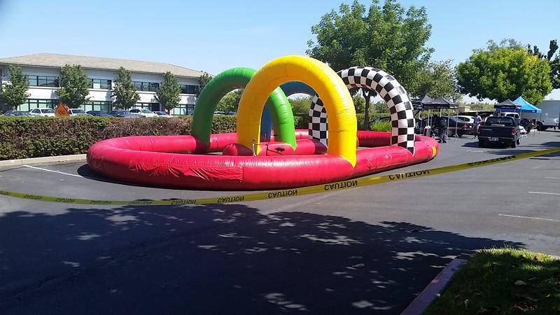 Wacky Race Track with 2 Giant Trikes | SacJumps | water slide and ...